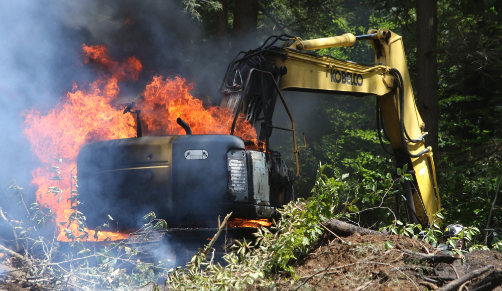 Excavator clearing land destroyed by fire | Litchfield.bz